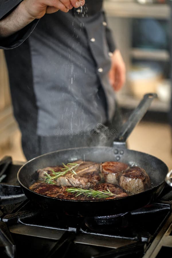 Chef Putting Salt for Cooking Meat Stock Image - Image of salt, juicy ...