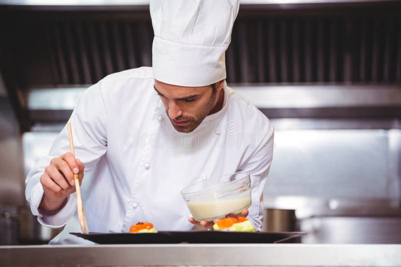 Chef Putting Sauce on a Dish Stock Image - Image of catering, adult ...