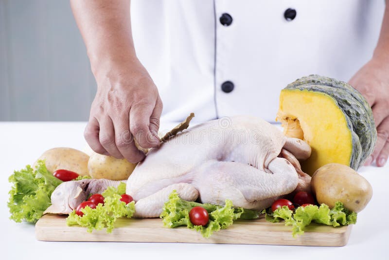Chef Putting Seasoning To Raw Chicken Stock Photos - Free & Royalty ...