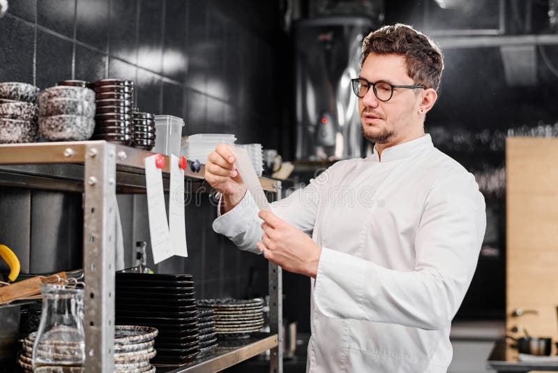 Chef Reading Order of Guest Stock Image - Image of culinary, staff ...
