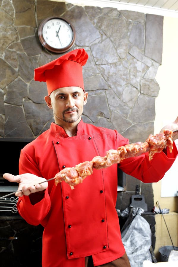 Chef in red stock image. Image of business, kitchen, occupation - 44695689