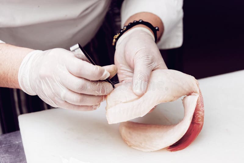 Chef is Removing Bones from Fish Fillet, Toned Stock Photo - Image of ...