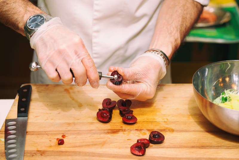 Chef is Removing Stones from Cherry, Toned Stock Photo - Image of ...