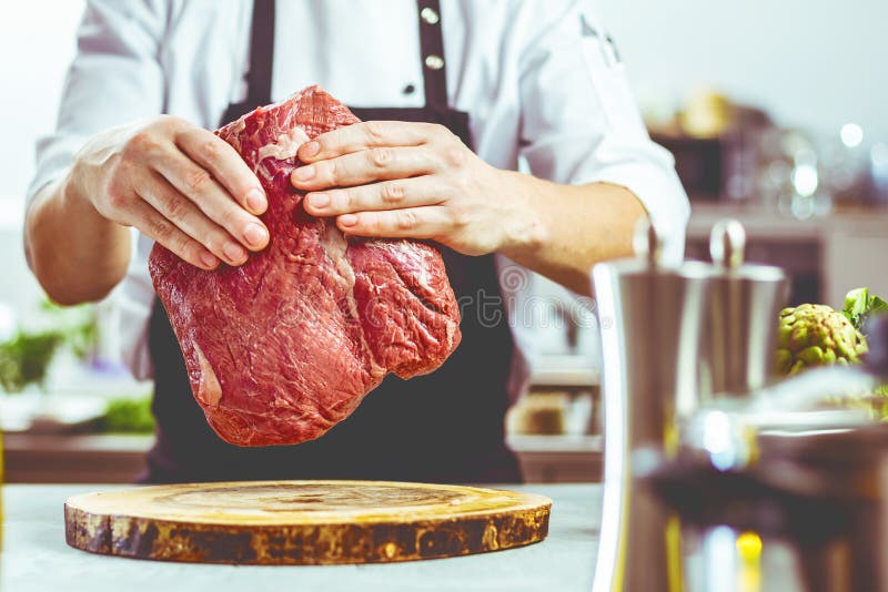 Chef in Restaurant Kitchen Cooking Something Stock Photo - Image of ...