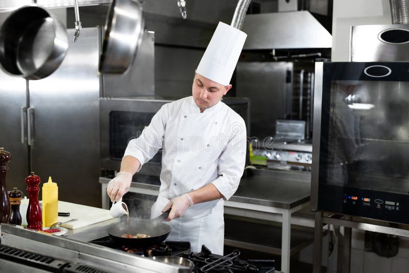 Chef Roasts Prawns in a Frying Pan. Stock Photo - Image of gourmet ...