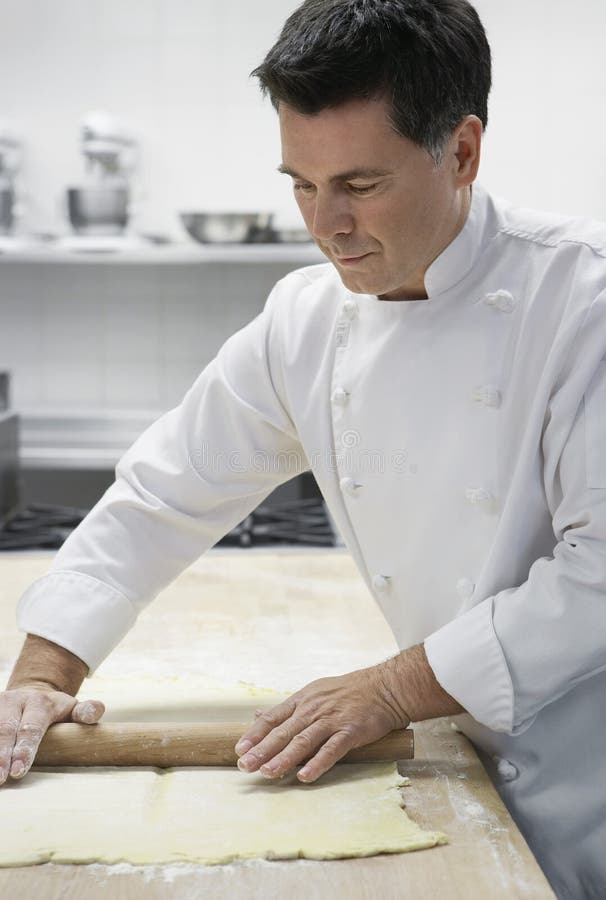 Male Chef Rolling Dough with Rolling Pin Stock Image - Image of ...
