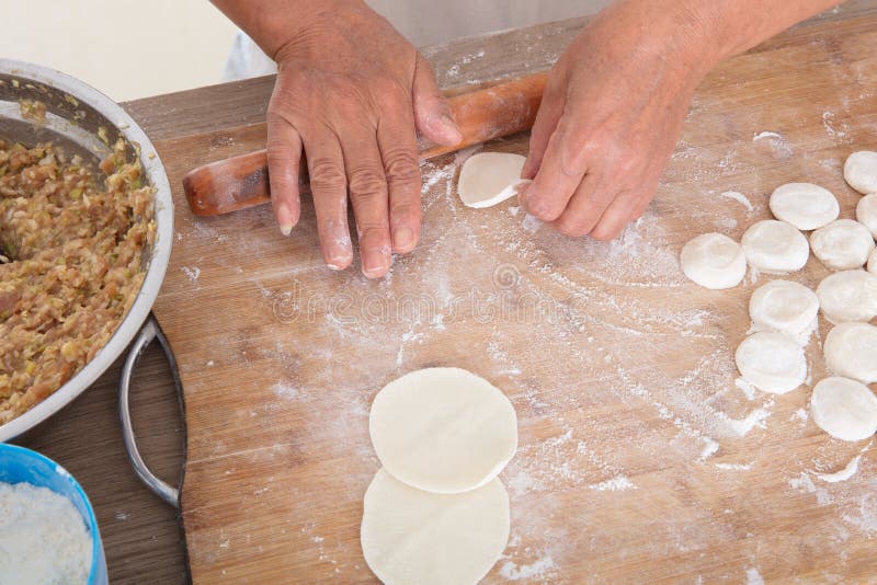The Chef is Rolling Out Dumpling Skins To Make Dumplings Stock Photo ...