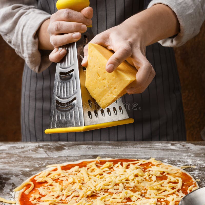 Chef Rubbing Cheese on Pizza, Using Grater Stock Image - Image of bake ...