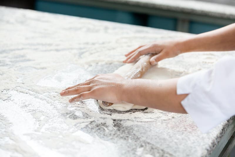 Chef S Hands Rolling Dough at Messy Counter Stock Photo - Image of ...
