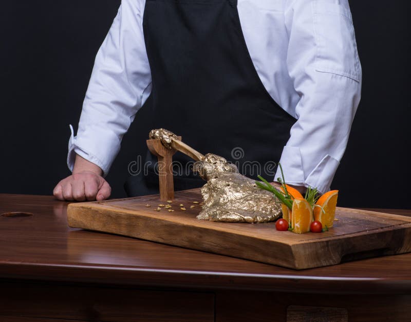 The chef serves the dish stock image. Image of background - 158539281