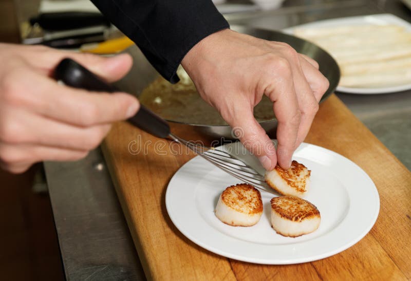 Chef is Serving Seared Scallops Stock Photo - Image of hands, healthy ...