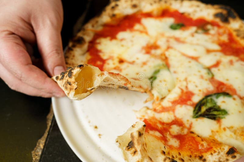 Chef Showing Cheese Pizza Crust Filled with Air Stock Photo - Image of ...