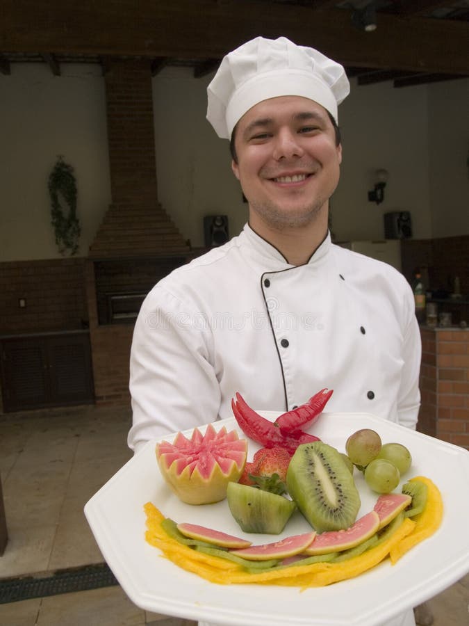 Chef Showing Plate with Fruit Stock Photo - Image of desert, cook: 4405426