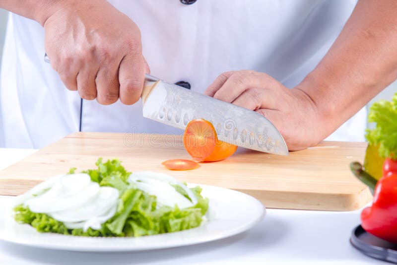 Chef sliced tomato stock photo. Image of healthy, meal - 47974638