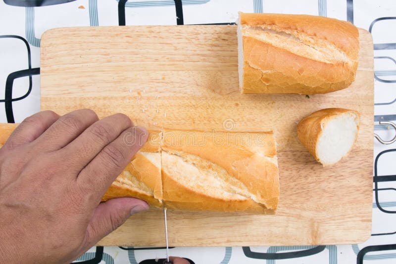 Chef slicing bread stock photo. Image of bake, bread - 75486274