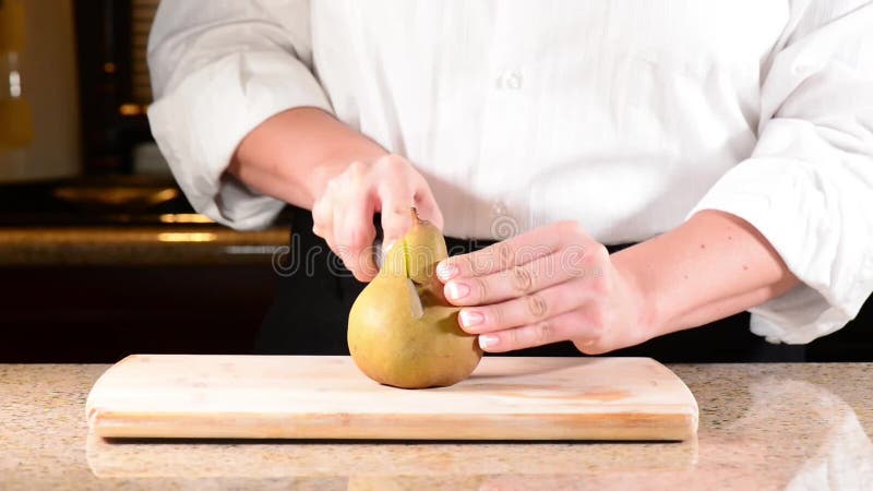 A Chef Slicing Onions with Precision. Skillfully Cutting through the ...