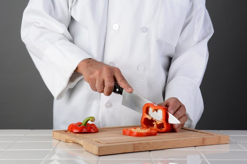 Chef Slicing Red Bell Pepper Stock Image - Image of person, bell: 34436755