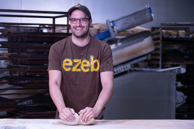 Chef is Smiling and Looking at the Camera while Making the Dough of the ...