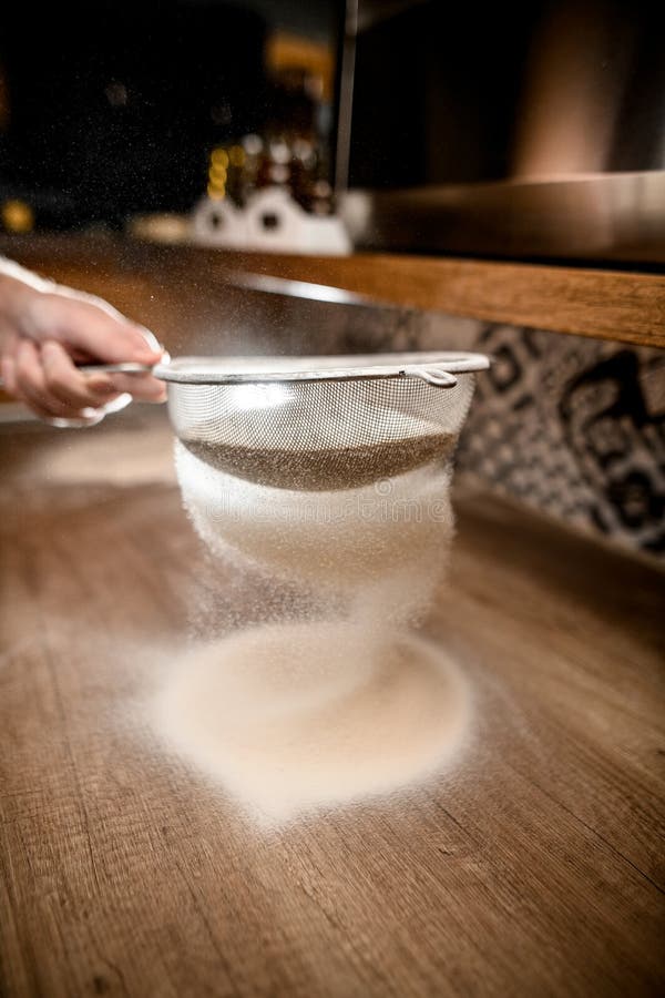 Chef Sowing Flour, Preparing for the Dough Kneading Process Stock Photo ...