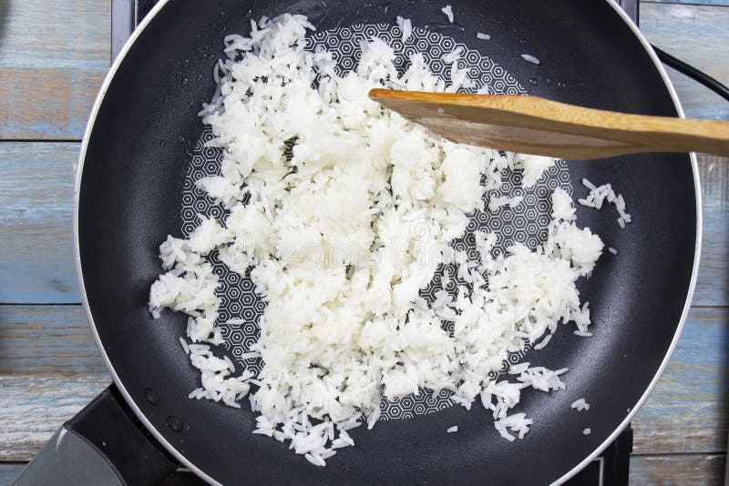 Chef Stiring Cooked Rice in the Pan Stock Image - Image of closeup ...