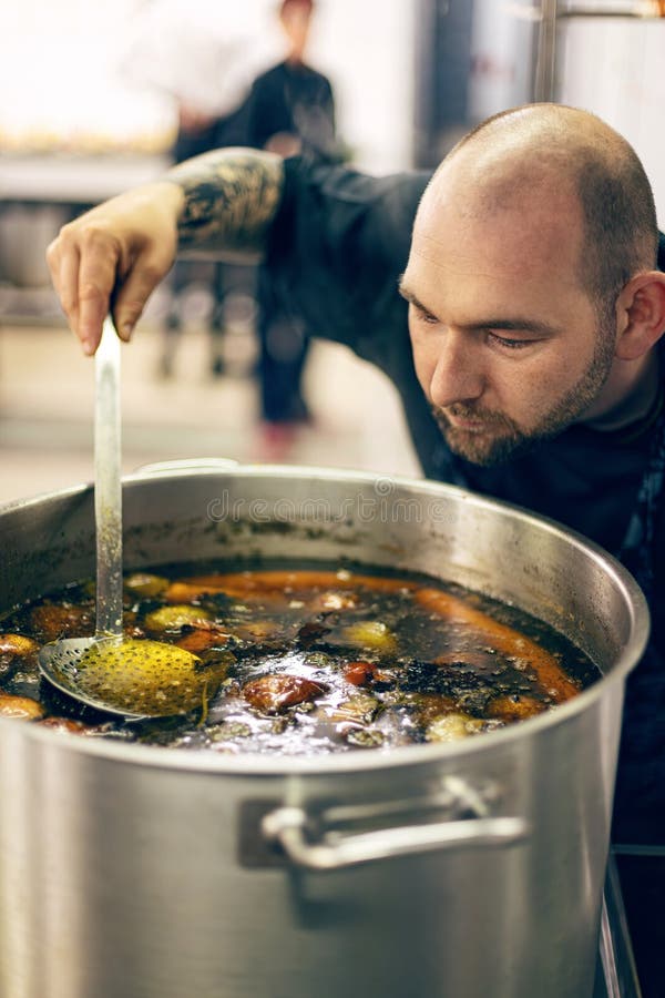 Chef tasting soup stock photo. Image of chef, cooking - 318780606