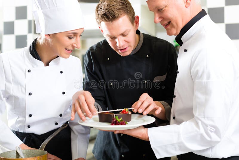 Chef Team in Restaurant Kitchen with Dessert Stock Image - Image of ...