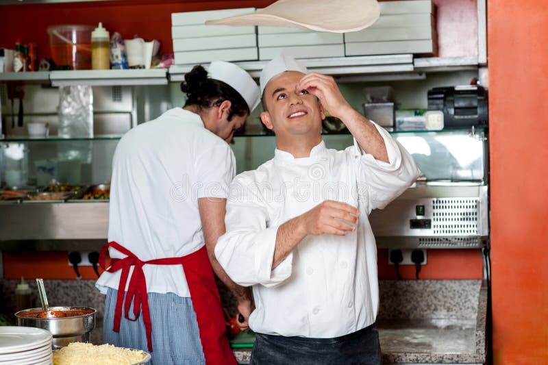 Chef Throwing the Pizza Base Dough Stock Photo - Image of skilled ...