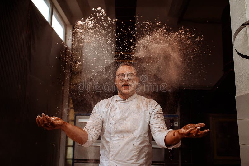 Chef Throws Flour and Cocoa Stock Photo - Image of bakery, kitchen ...