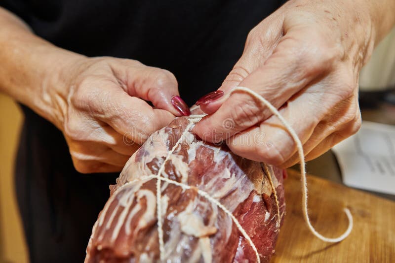 Chef Ties the Beef with Rope and Prepares it for Baking in the Oven ...