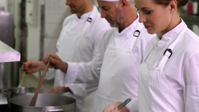 Chef Tossing Vegetables in a Wok Over a Large Flame Stock Video - Video ...