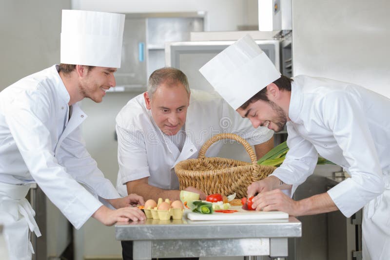 Chef Training Students in Restaurant Kitchen Stock Photo - Image of ...