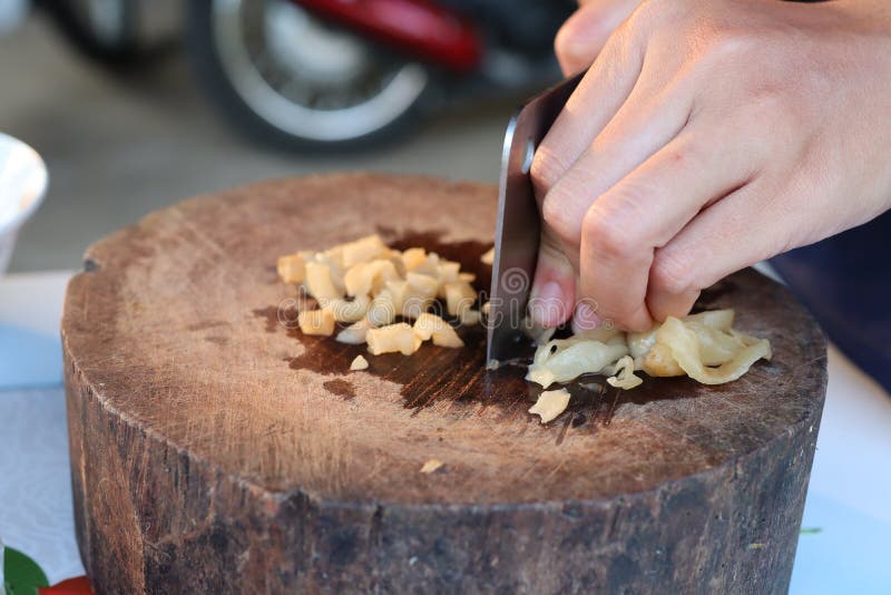 The Chef is Turning the Vegetables with a Sharp Knife. Stock Photo ...