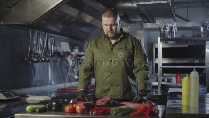A Chef in a Uniform Puts the Main Ingredient of the Dish. Stock Video ...