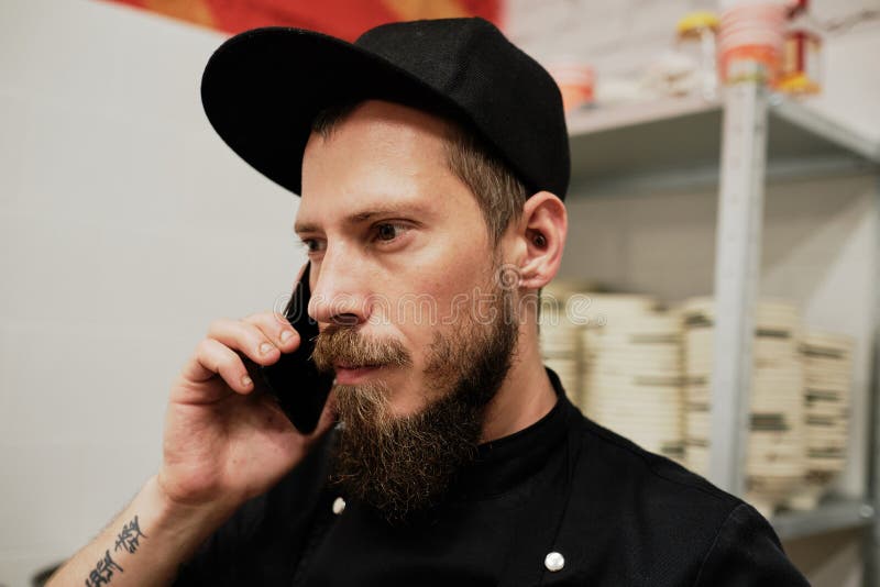 Chef Using Cell Phone at Work Stock Image - Image of preparing, brutal ...