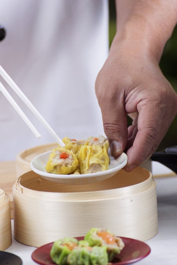 Chef Using Chopsticks Hold Chinese Dumpling Stock Image - Image of meal ...