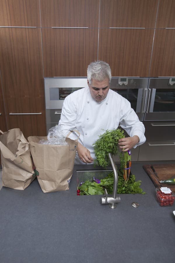 Chef Washing Vegetables in Kitchen Sink Stock Photo - Image of adult ...