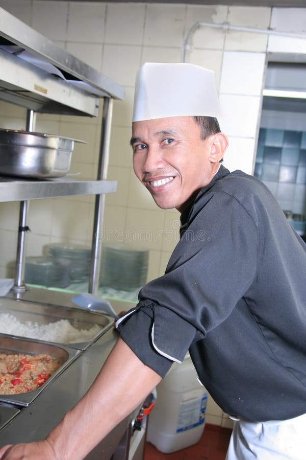 Chef at work stock photo. Image of hotel, chef, kitchen - 6264164