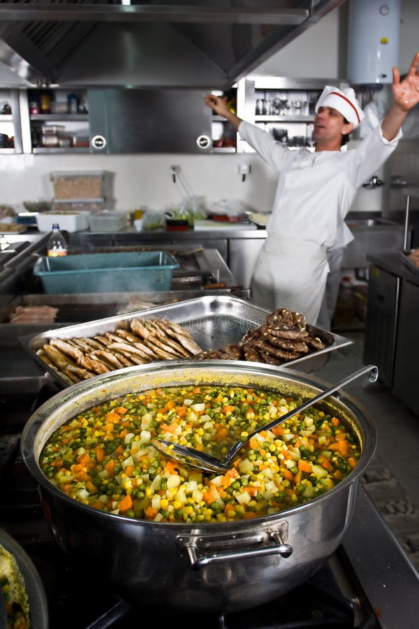 Two chefs at work stock photo. Image of gourmet, chef - 6401604