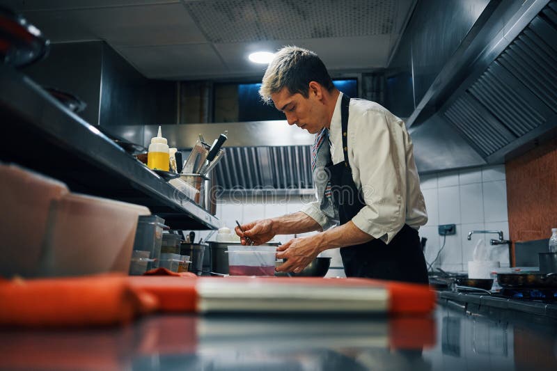 Chef Working at the Counter Stock Photo - Image of restaurant, adult ...