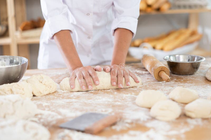 Chef Working with Dough in a Bakery Stock Image - Image of kneading ...