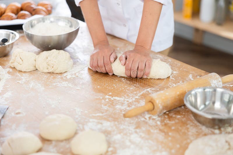 Chef Working with Dough in a Bakery Stock Photo - Image of craft ...