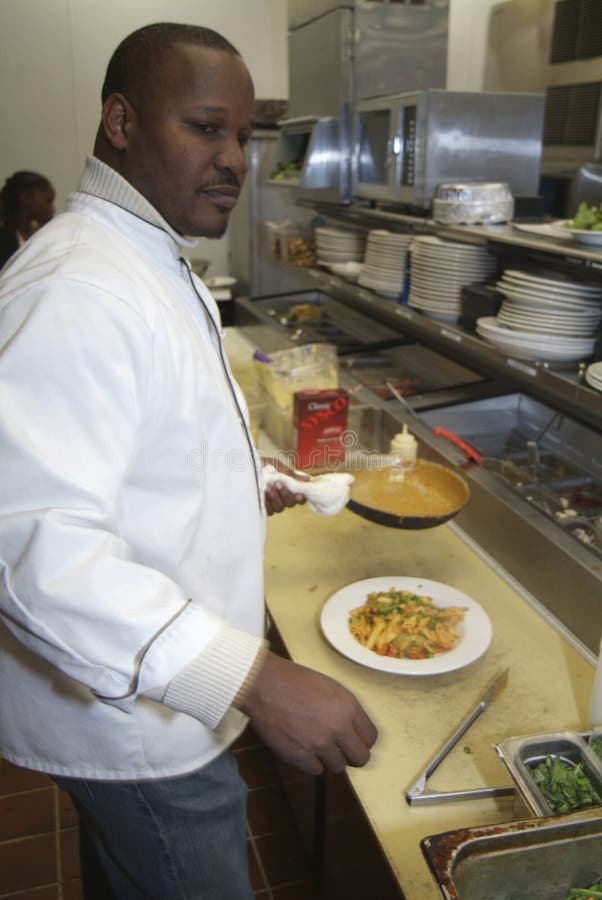 Chef Is Working Hard To Cook Tasty Meal Editorial Stock Image - Image ...
