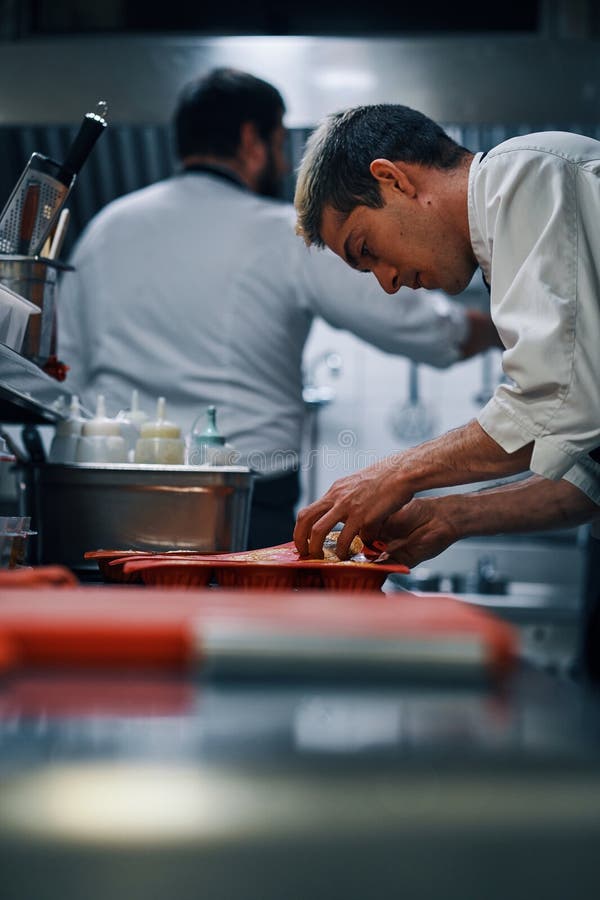 Chef Working in a Professional Kitchen, Haute Cusine Stock Image ...