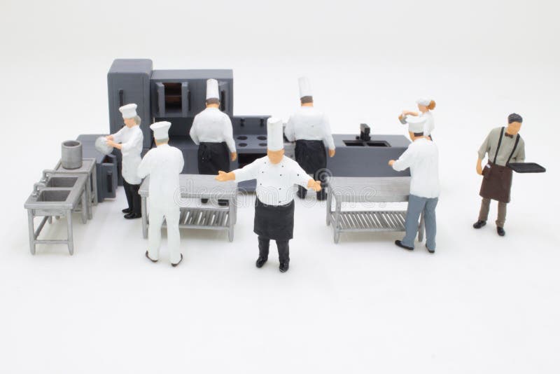 A Chef Works in a Big Restaurant Kitchen with His Help Stock Image ...