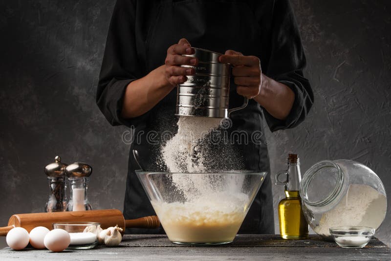 Chef Works with Flour. Bakery Preparing Bread and Pastries Stock Photo ...