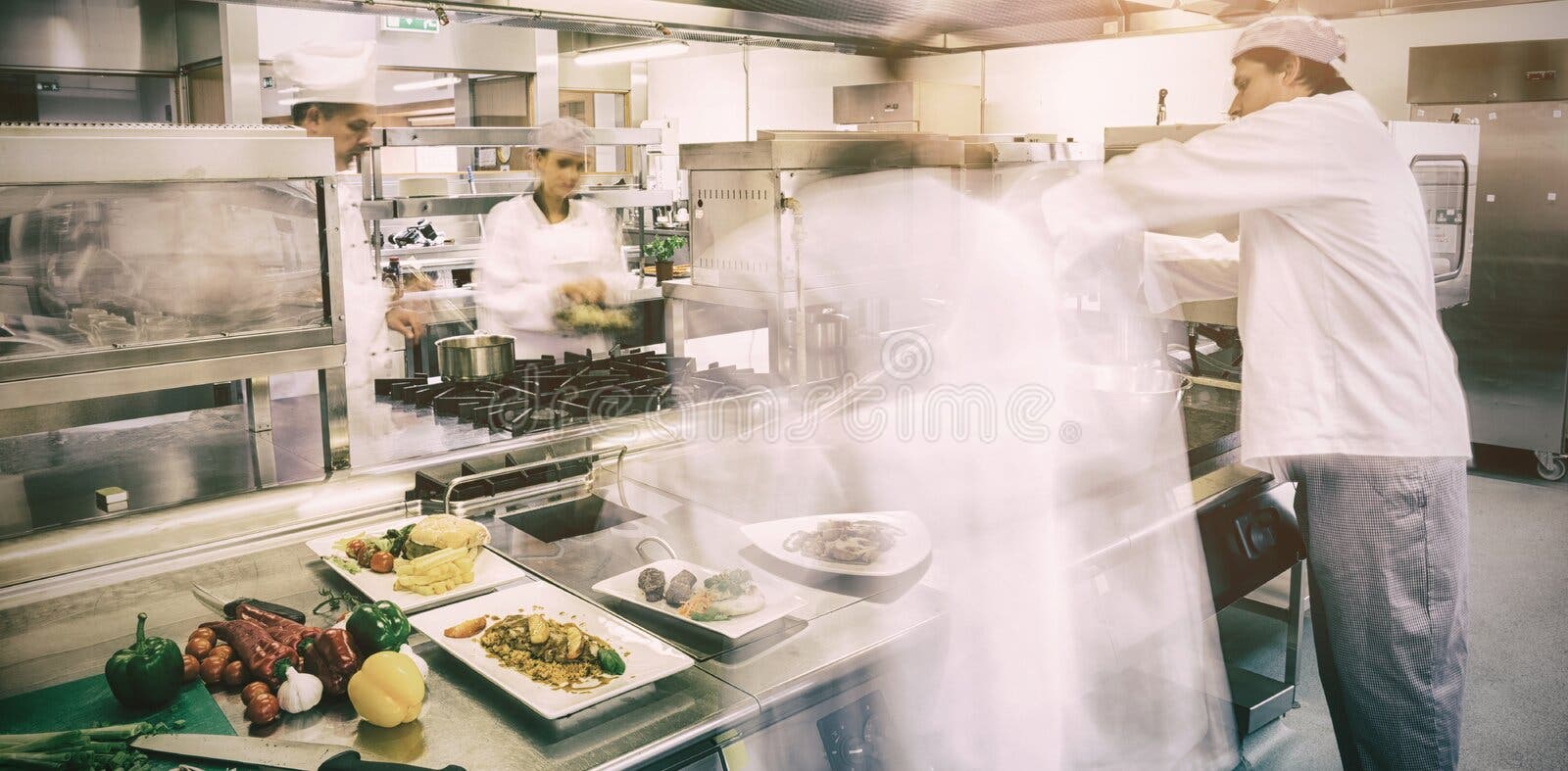 Busy Chefs at Work in the Kitchen Stock Photo - Image of sauce, dish ...