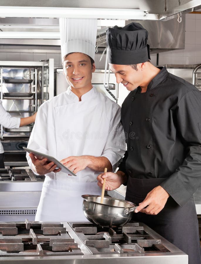 Chefs with Digital Computer Cooking Food Stock Image - Image of ...