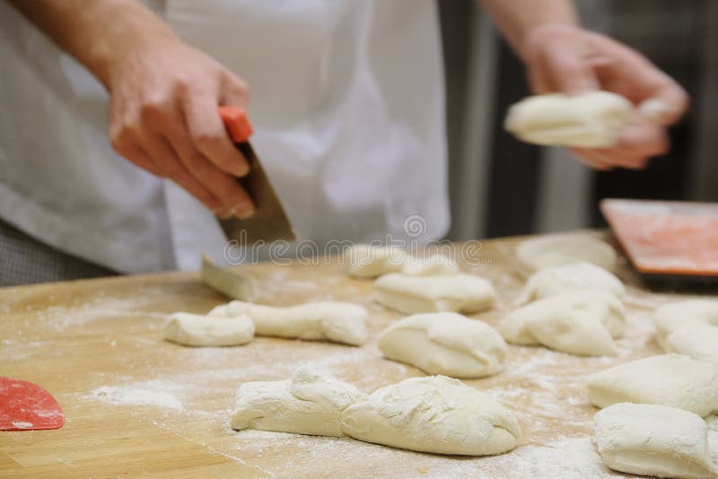 Chefs forming dough stock image. Image of preparation - 53399555
