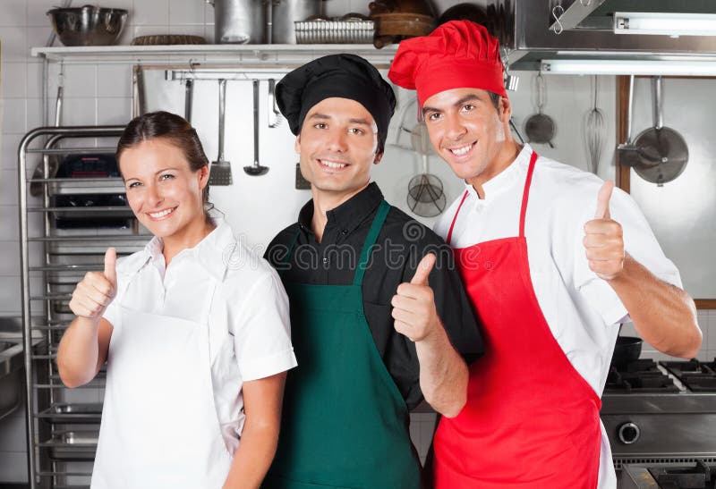 Chefs Giving Thumbs Up stock image. Image of indoor, restaurant - 36382617