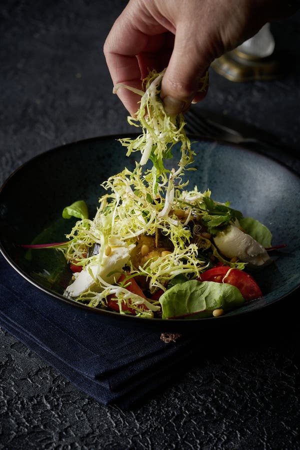 Chefs Hand Decorating a Salad Stock Image - Image of cooking, cuisine ...